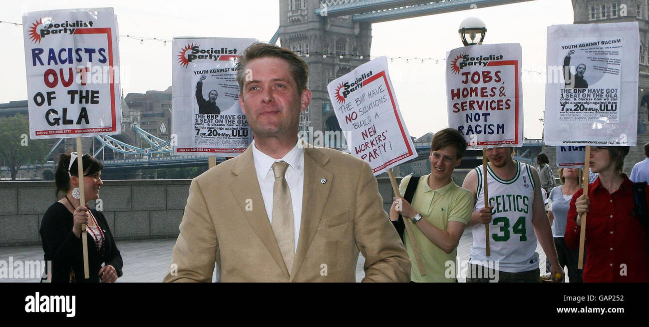 BNP London Assembly Member Richard Barnbrook faces protesters outside ...