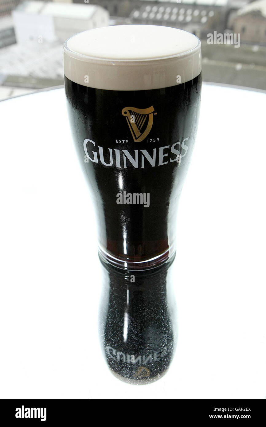 Guinness to sell half of historic brewery. A pint of Guinness, on a ...