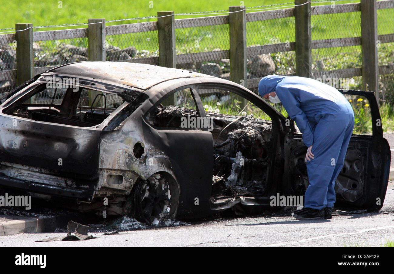 Bomb attack on Police car Stock Photo - Alamy