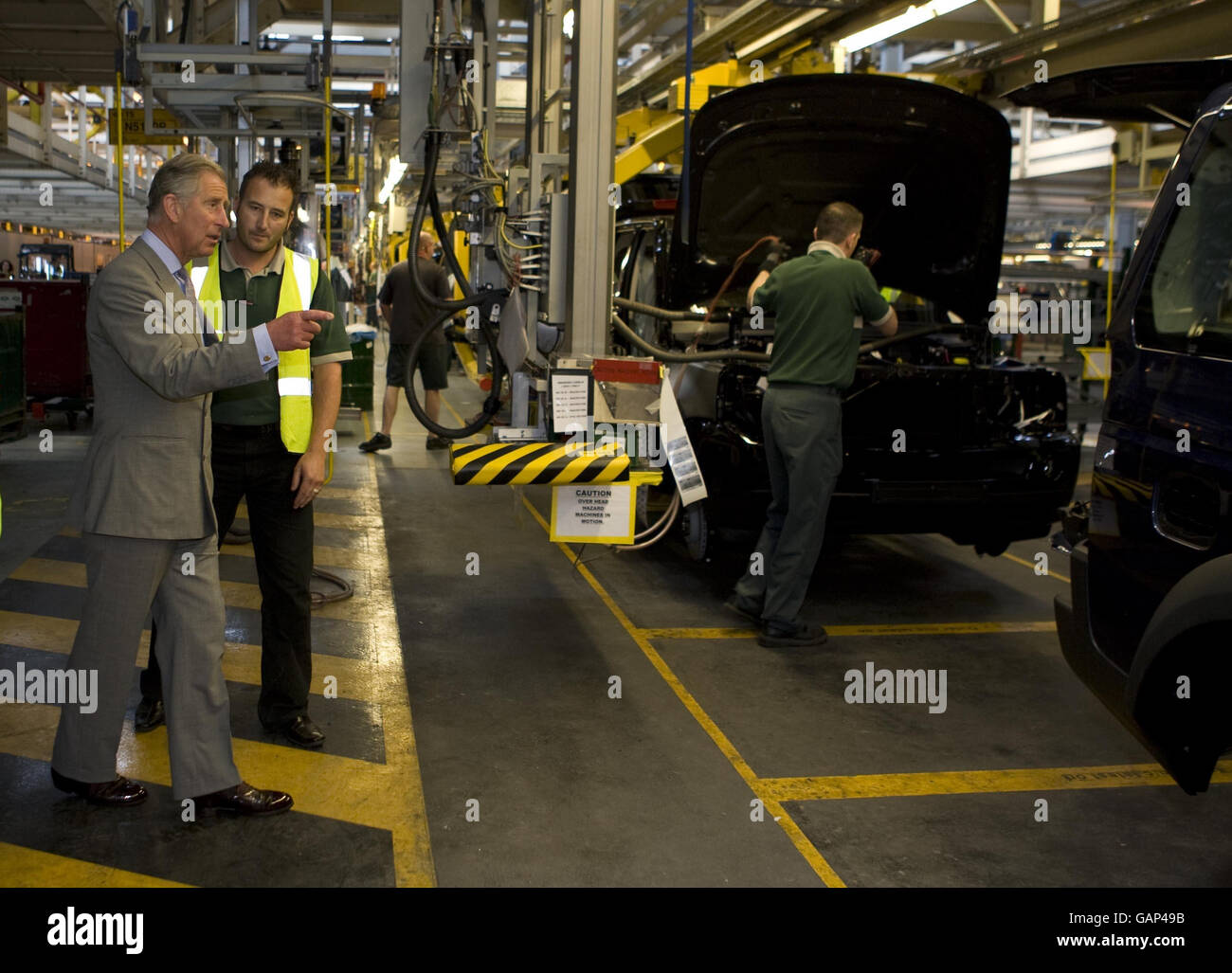The Prince of Wales, talks with workers during a visit to celebrate the ...