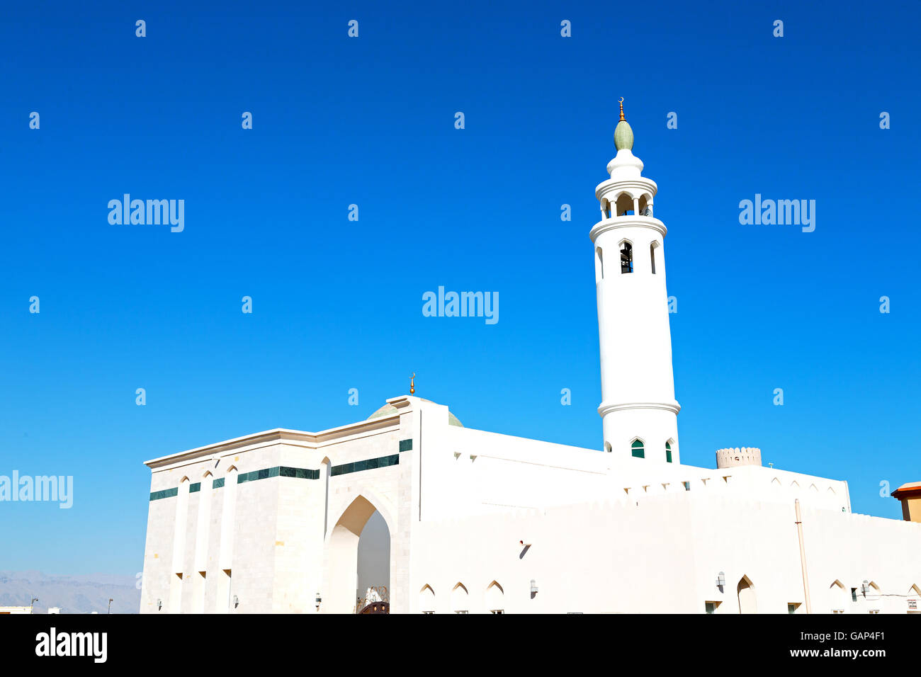 minaret and religion in clear sky in oman muscat the old mosque Stock ...