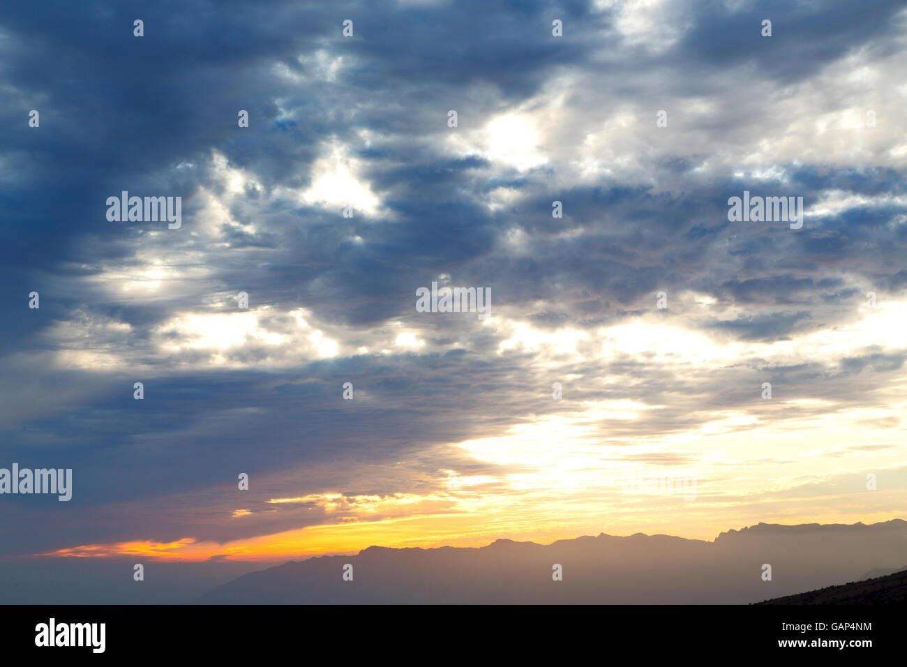 the blurred sun falling down arabian mountain in oman Stock Photo - Alamy