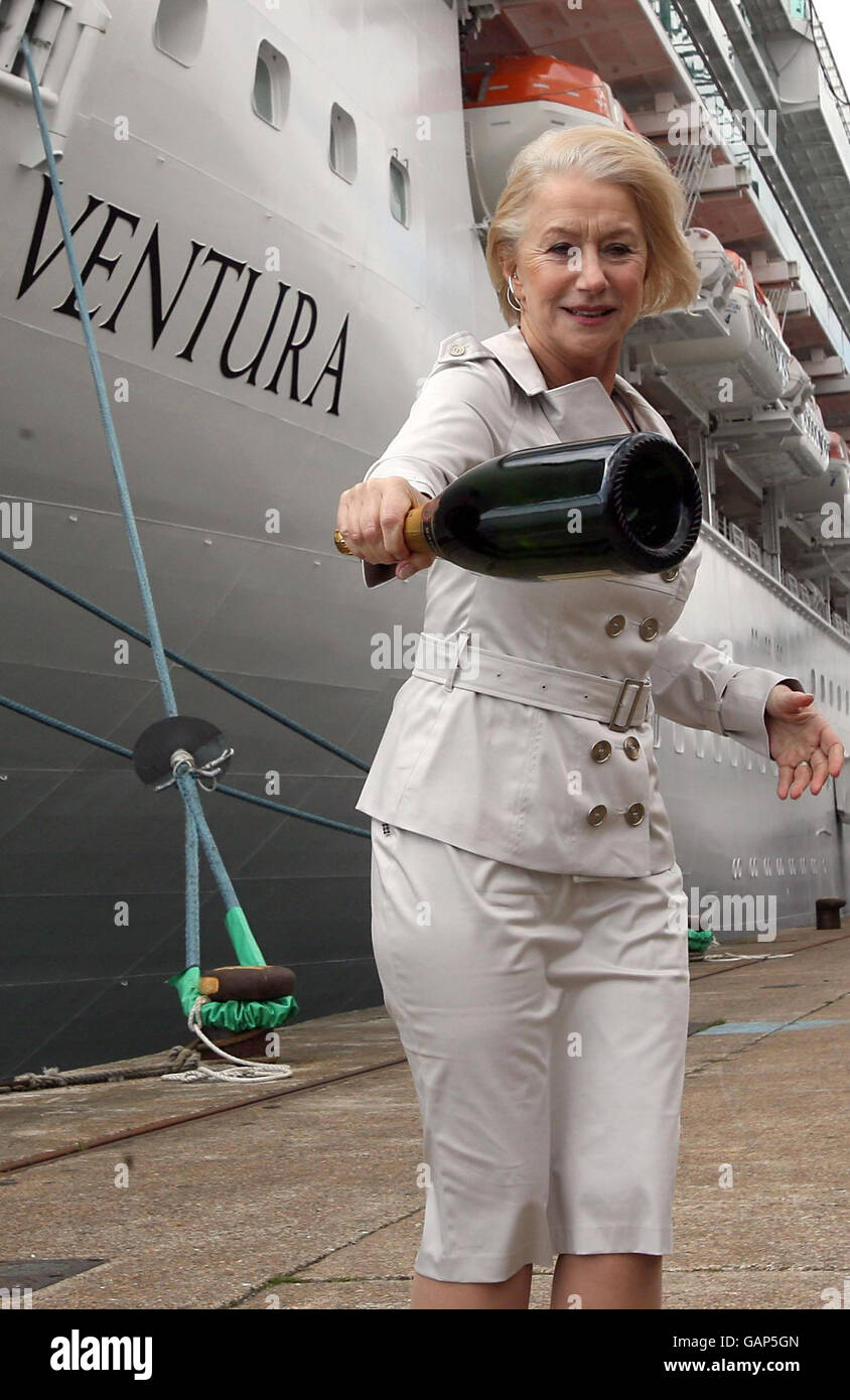 Dame Helen Mirren with a bottle of Champagne infront of P & O Cruises ...