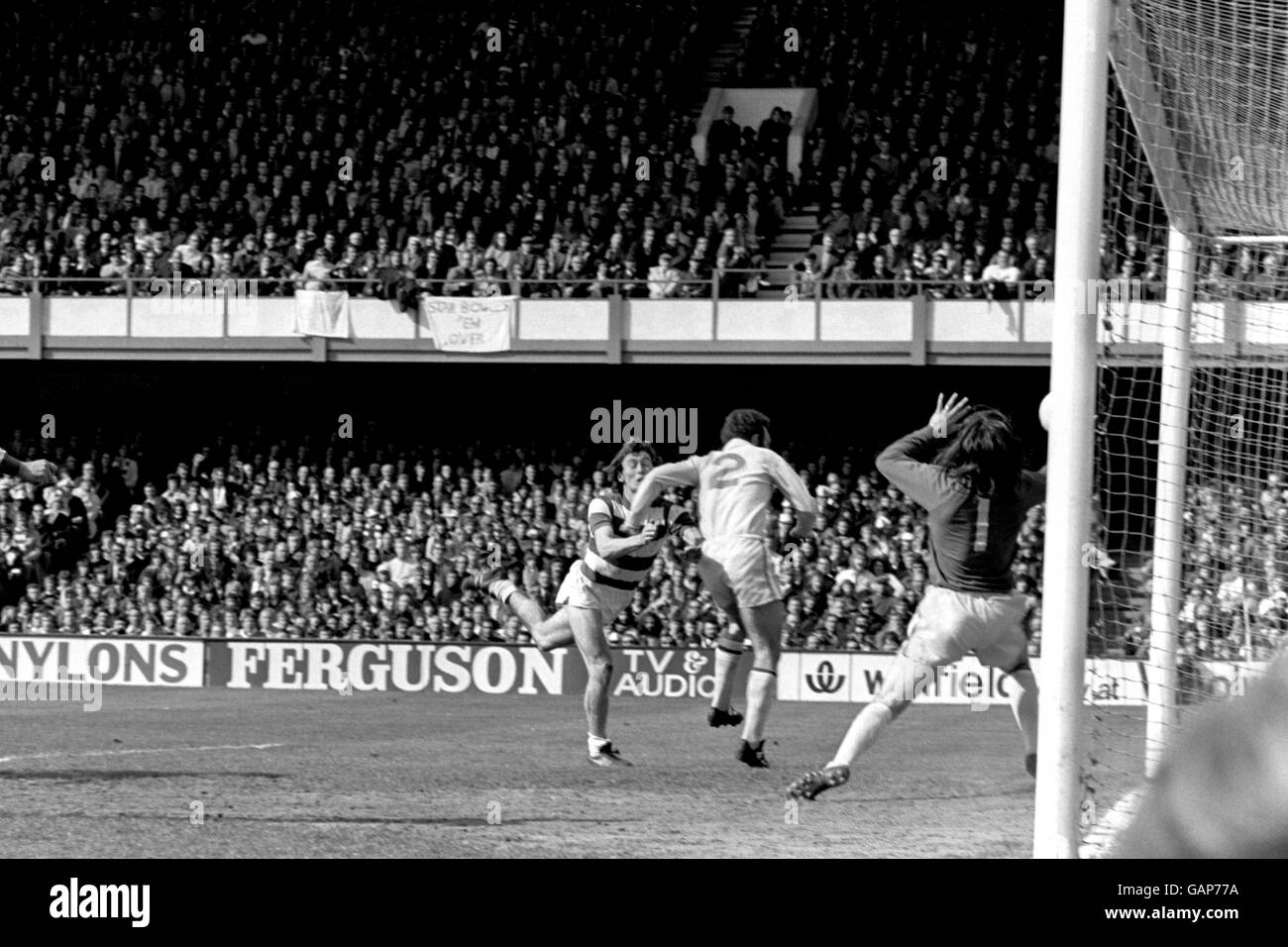 (L-R) Queens Park Rangers' Dave Thomas heads the first goal past Leeds ...