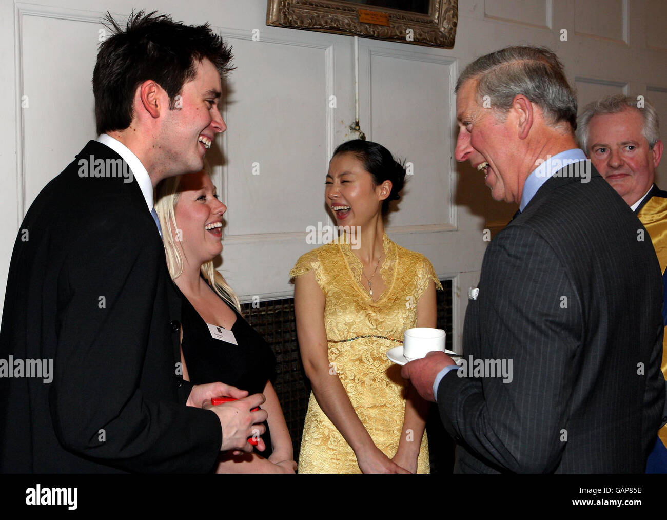 The Prince of Wales shares a laugh with (Left to Right) award winners ...