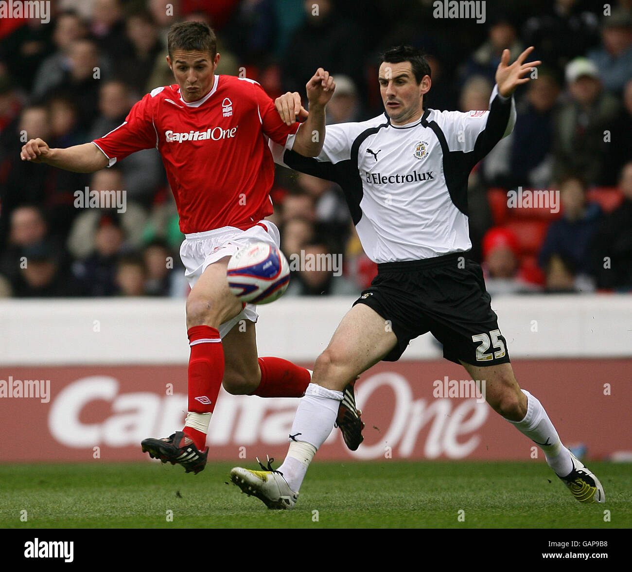 Nottingham Forest's Chris Cohen and Luton Town's Matthew Spring battle ...