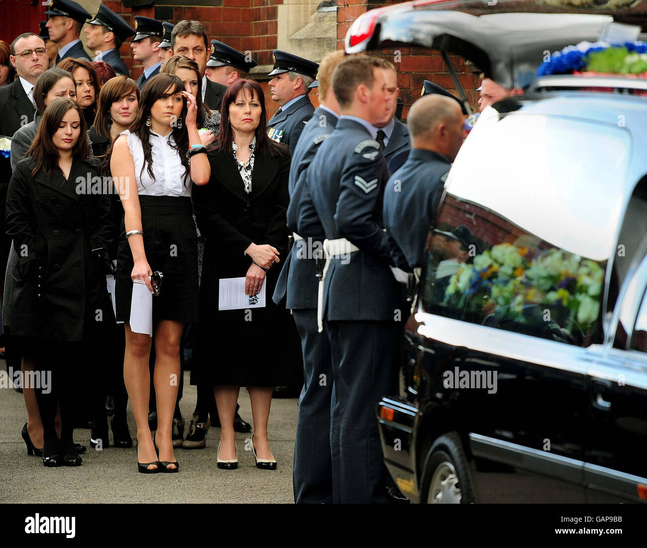 The coffin of Senior Aircraftsman Gary Thompson is carried from St Jude ...