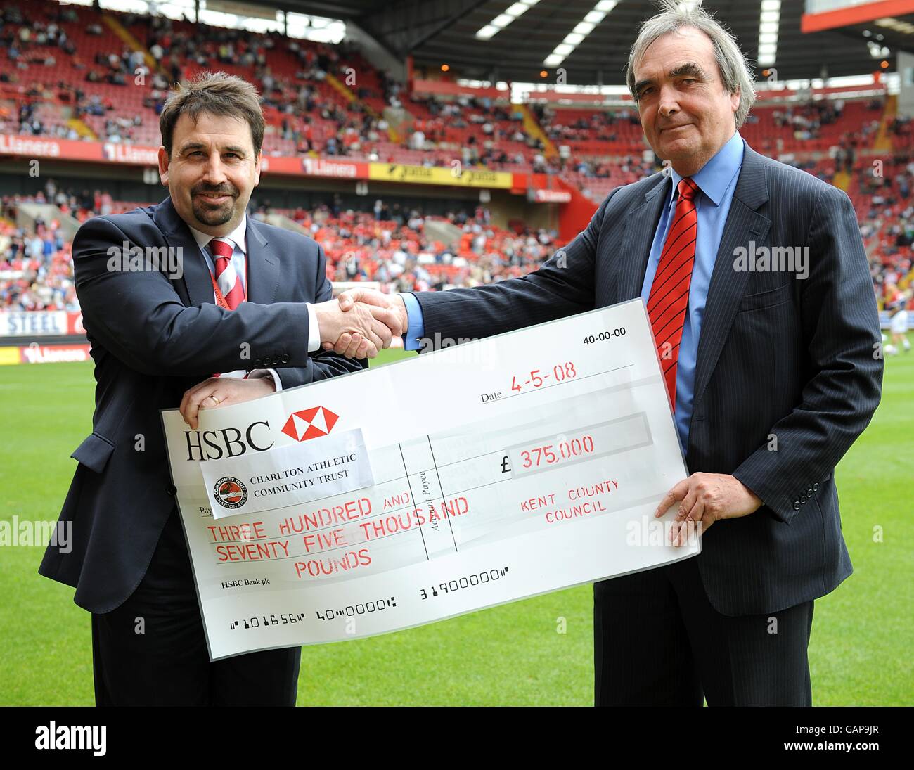 New Charlton Athletic Chief Executive Steve Waggott (l) presents a ...