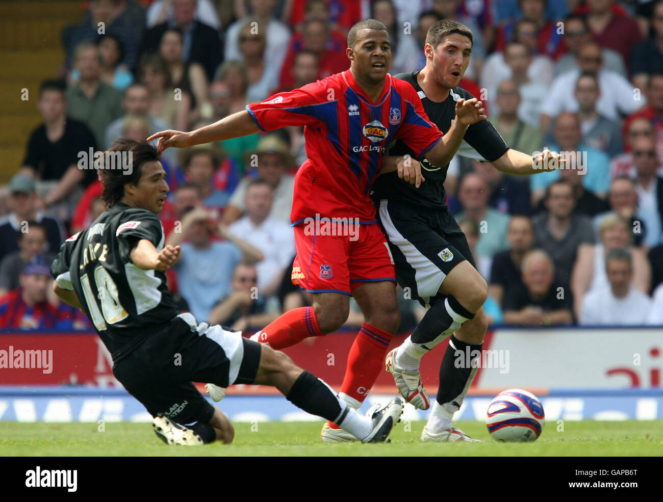 Crystal Palace's Tom Soares (centre) battles with Bristol City's Nck ...