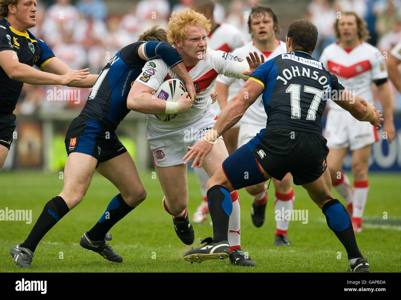 St Helens' James Graham breaks between Warrington's Mark Gleeson and ...
