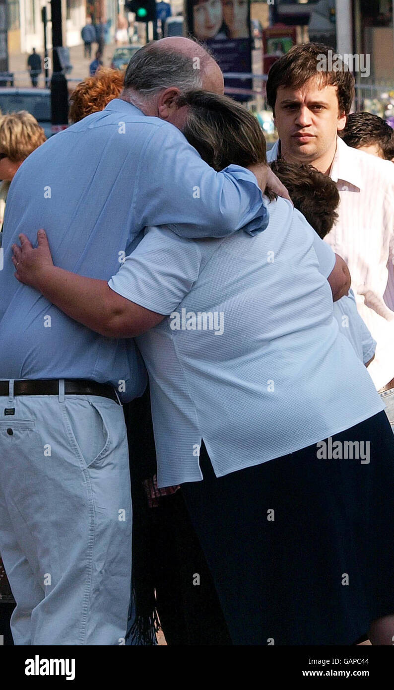 Barry Mizen, father of murdered 16-year-old Jimmy Mizen, is hugged by a ...