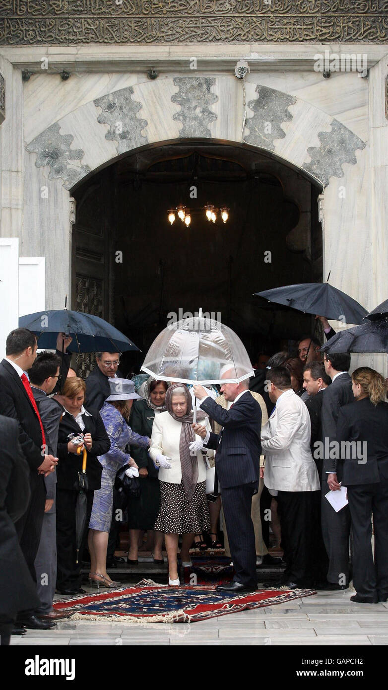Britain's Queen Elizabeth II leaves the Green Mosque in the eastern ...
