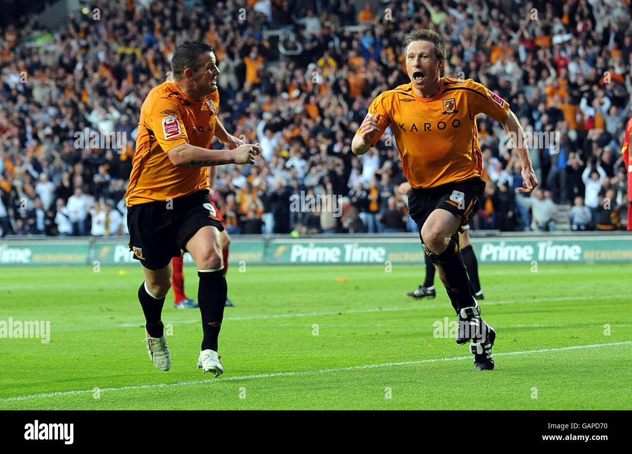 Hull City's Nick Barmby (right) celebrates with Dean Windass after ...