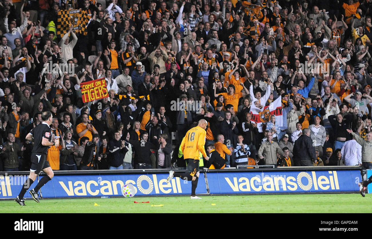 Hull City's Caleb Folan celebrates in front of the home fans after ...