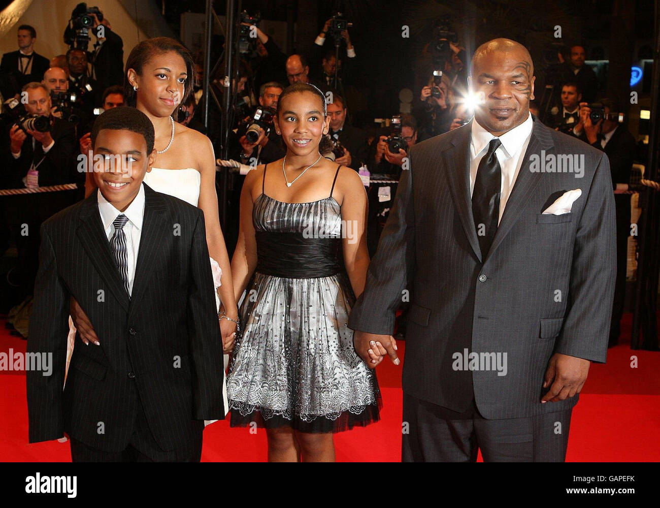 AP OUT Mike Tyson and family arrive for the screening of new ...
