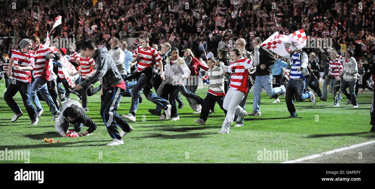 Doncaster Rovers fans celebrate following the Coca Cola League One Play ...