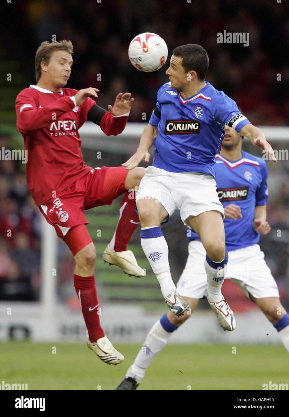 Rangers' Barry Ferguson challenges Aberdeen's Darren Mackie during the ...