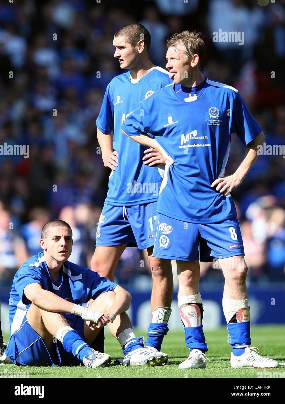 Queen Of The South's Steve Tosh (right), Scott Robertson (centre) and ...