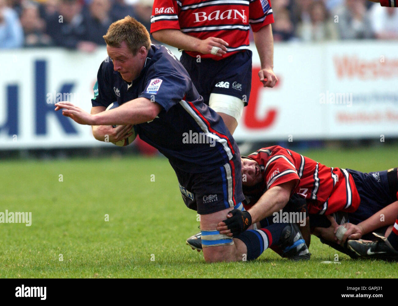 Sale Sharks' Dean Schofield is tackled by Gloucester's Jake Boer Stock ...