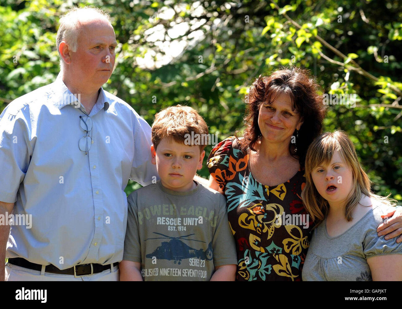 Barry and Margaret Mizen with their children George and Samantha stand ...