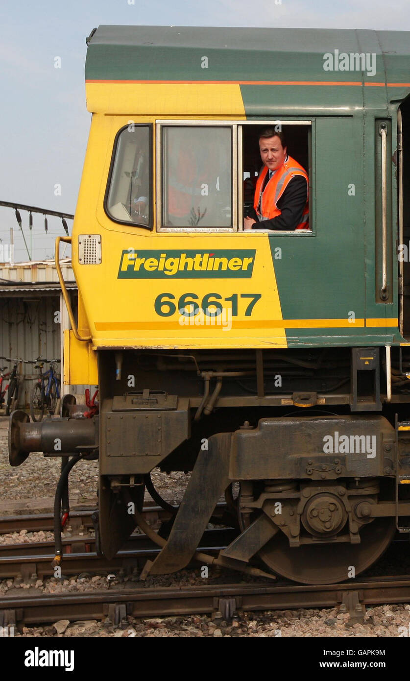 Leader of the Conservative Party David Cameron aboard the cab of a ...