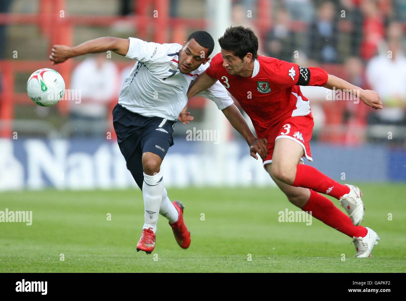 Wales joe jacobson and englands theo walcott hi-res stock photography ...