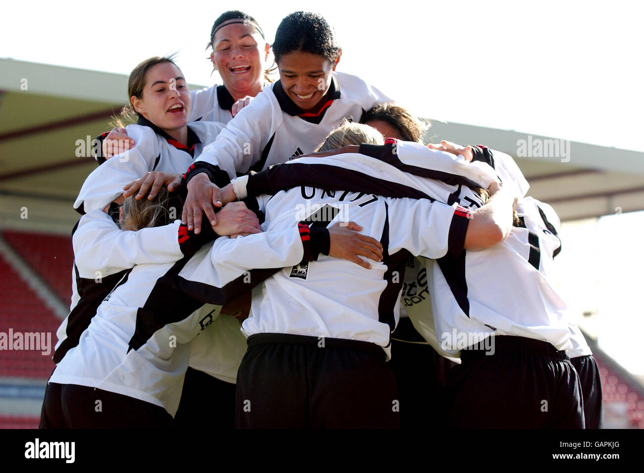 Fulham's captain Mary Phillip (c) and the rest of her team celebrate ...