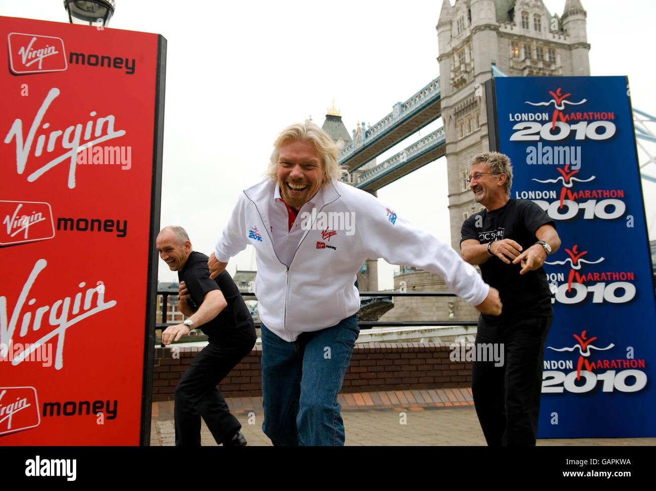 Richard Branson (centre) with boxer Barry McGuigan and Eddie Jordan ...