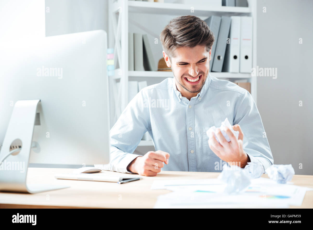 Man ripping paper hi-res stock photography and images - Alamy