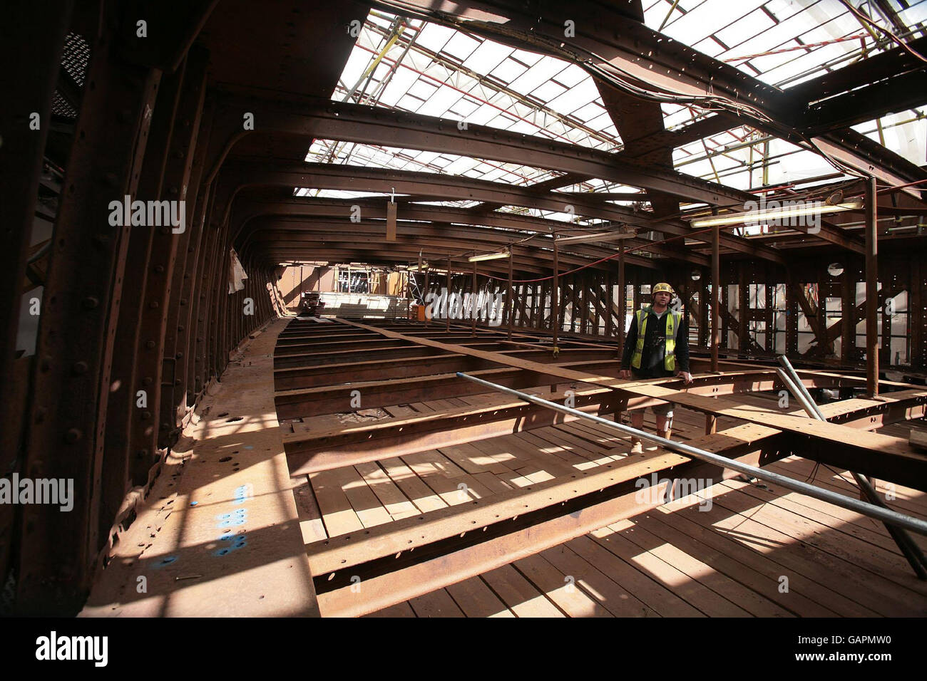 A general view of a worker inside the Cutty Sark which was severely ...