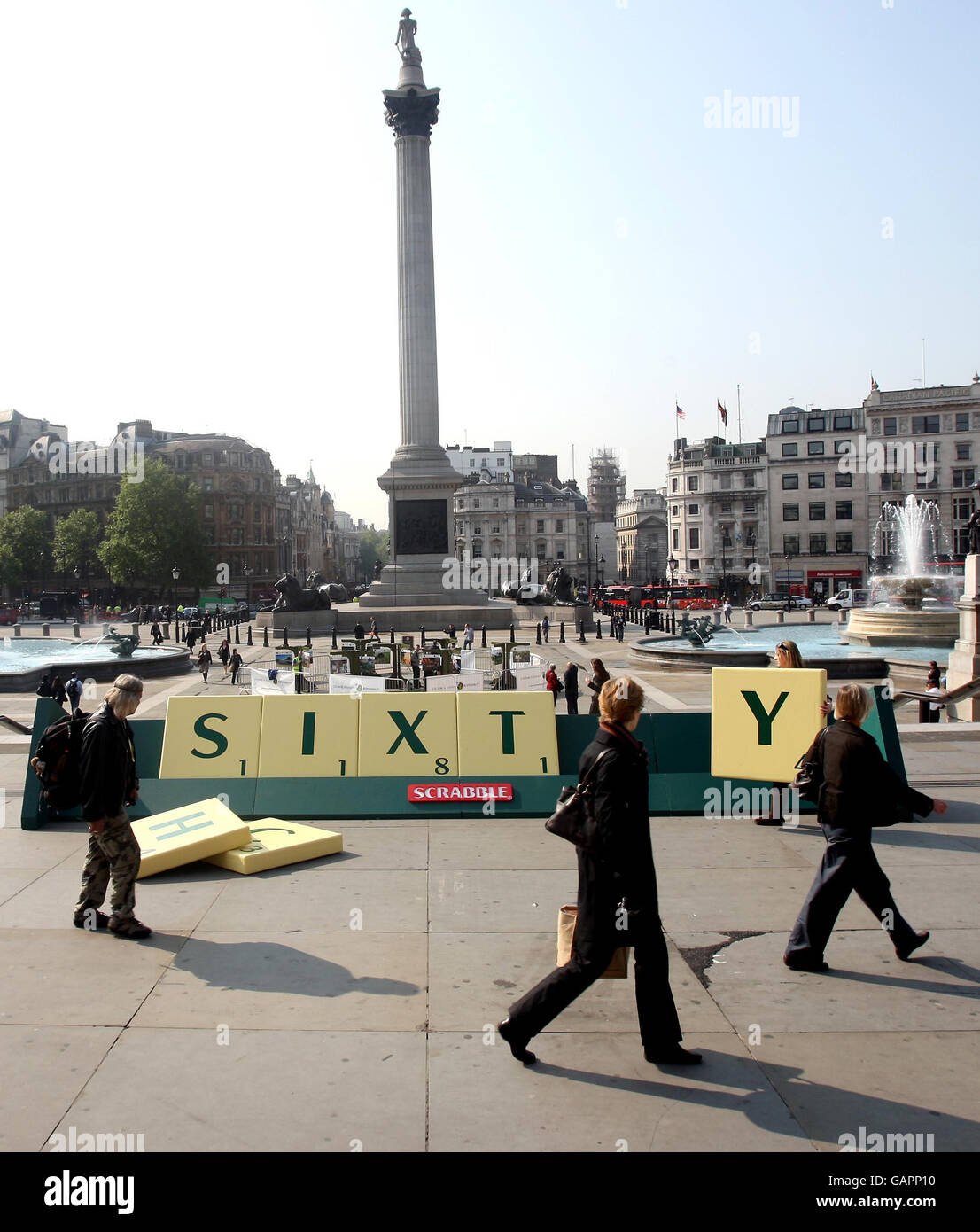 Jacey Bunker constructs a seven-metre wide Scrabble tile rack with one ...