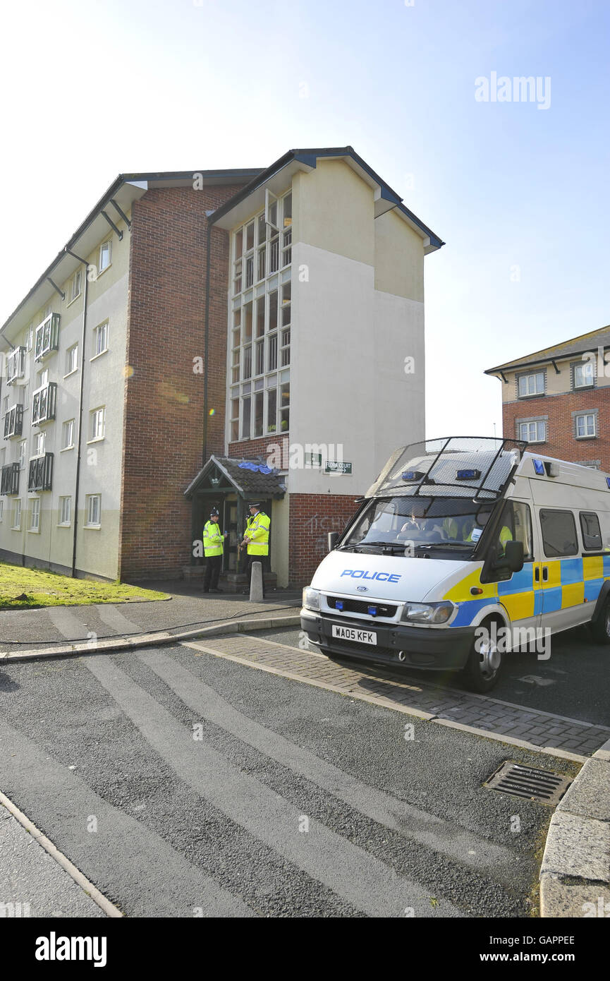 Police officers outside the King Street, Plymouth, home of terror ...