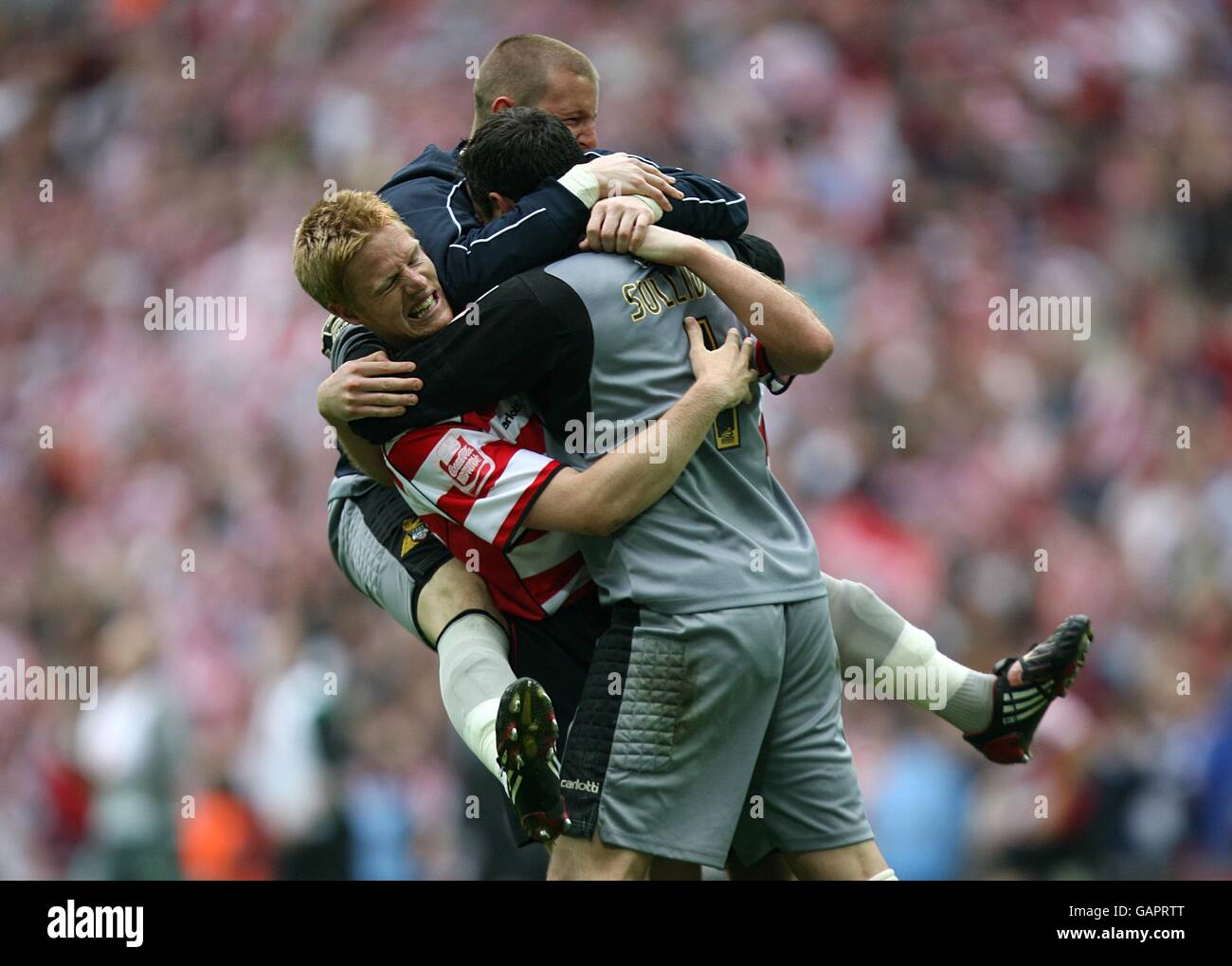 Doncaster Rovers' Neil Sullivan (right) celebrates with team mates Adam ...