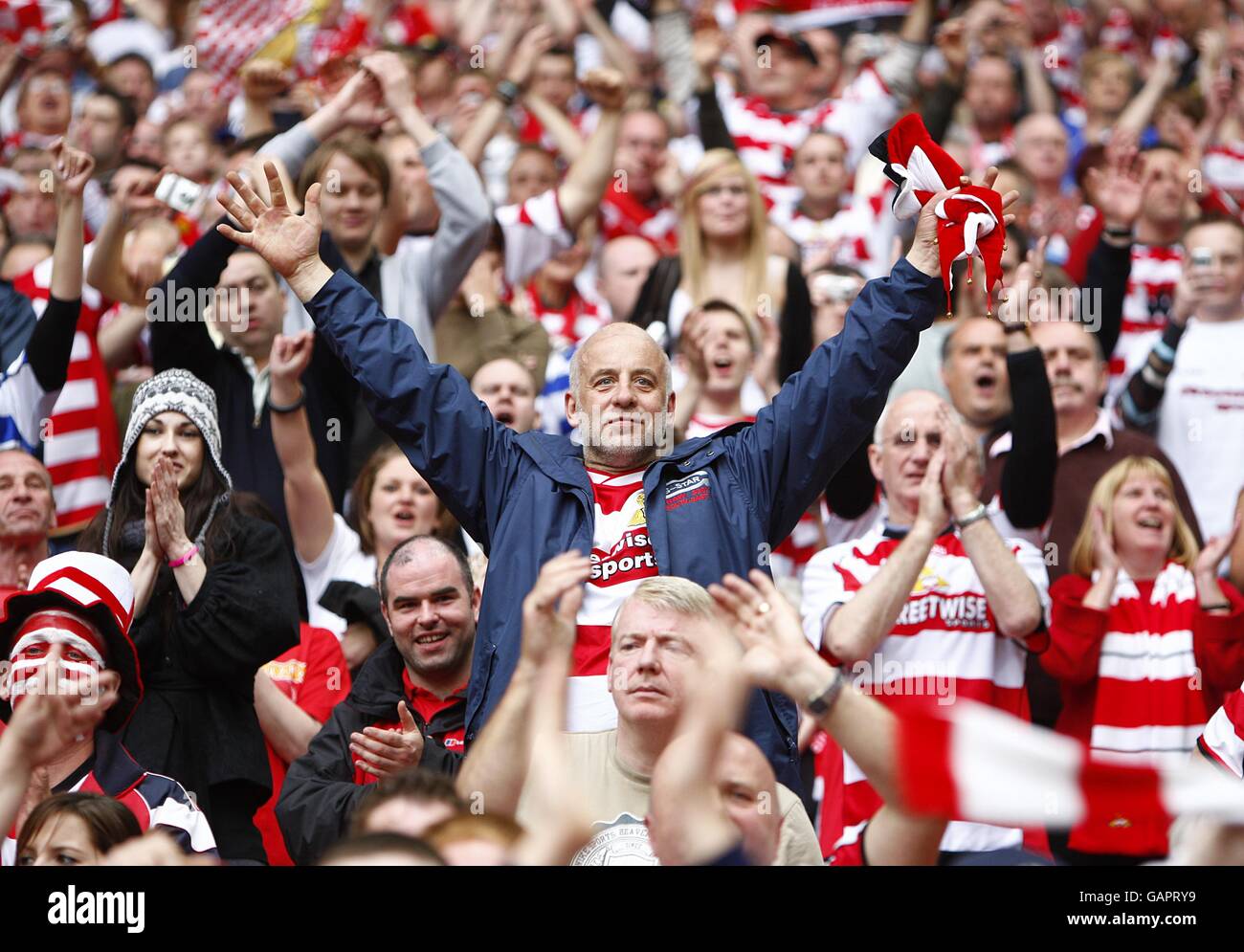 Doncaster Rovers fans celebrate after the final whistle Stock Photo - Alamy