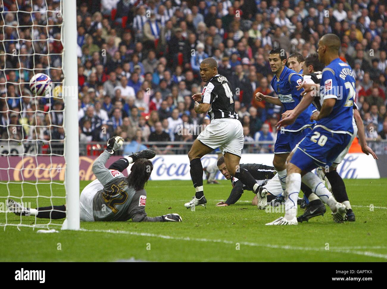 Rochdale's Nathan Stanton (number 4) scores an own goal to level the ...