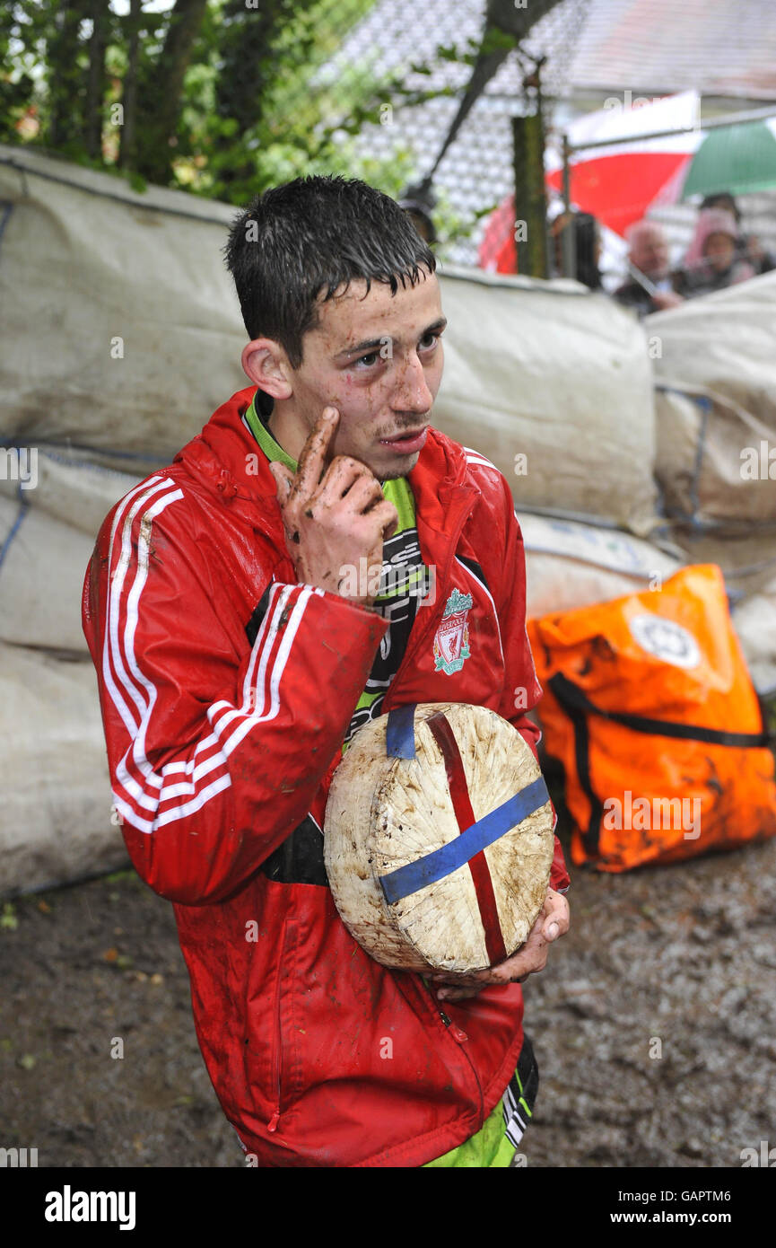 Winner of the first men's race at the annual cheese rolling event at ...