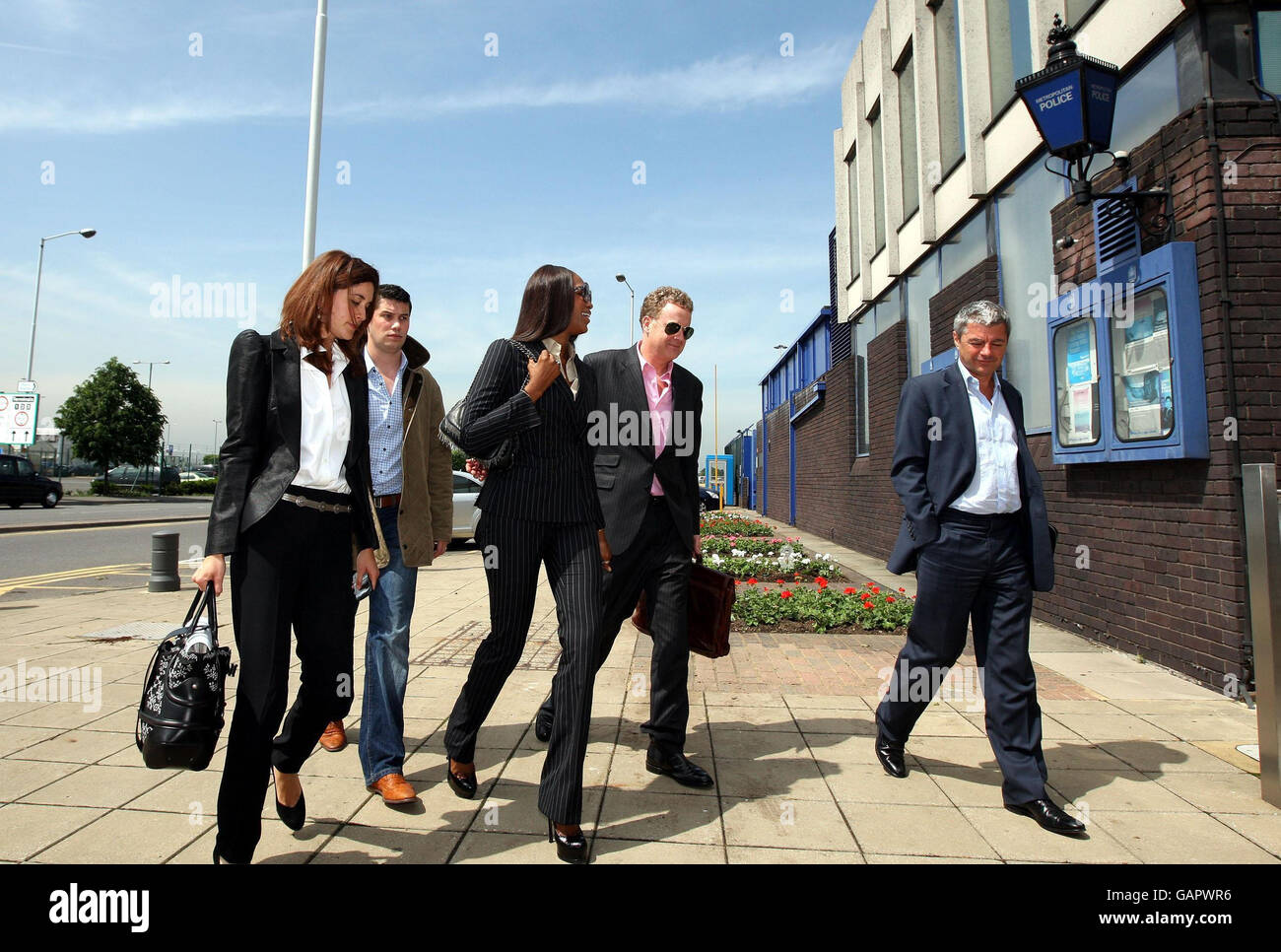 Supermodel Naomi Campbell, 37, (centre) arriving at Heathrow Police ...
