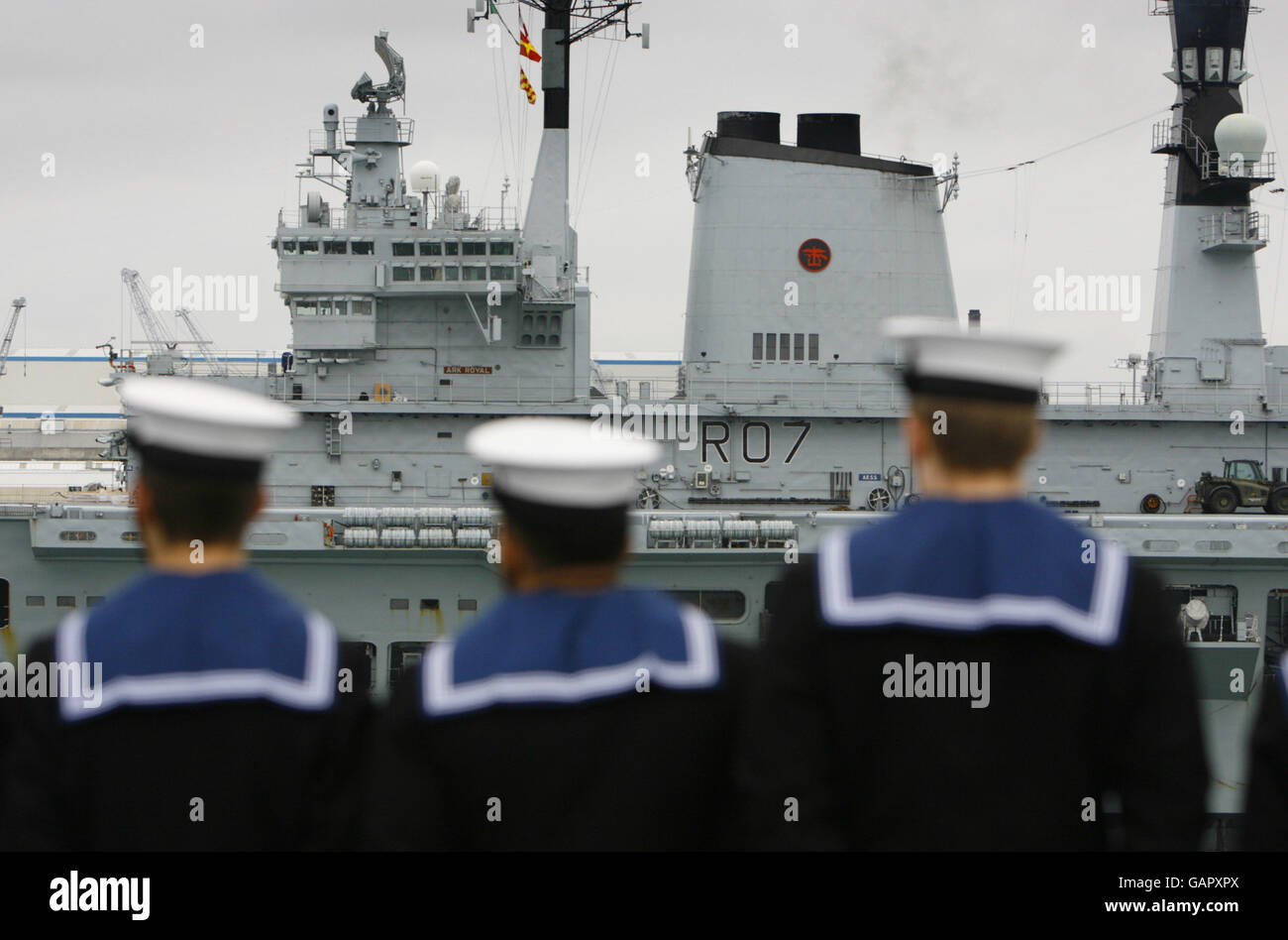 HMS Illustrious passes the Royal Naval Flagship HMS Ark Royal (top) as ...