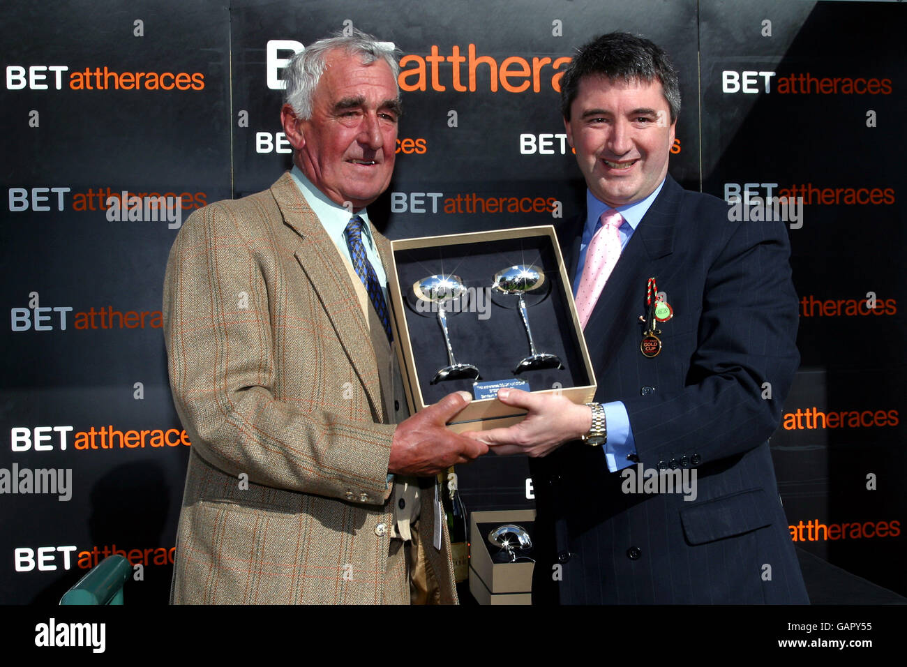 Trainer Josh Gifford (l) receives his award for Skycab winning the ...