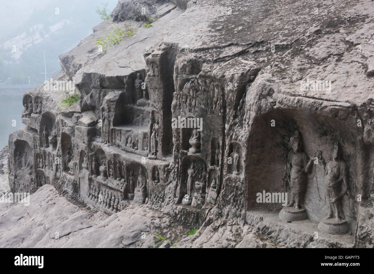 Longmen Grottoes, Henan, China, Smaller Grotto Stock Photo - Alamy