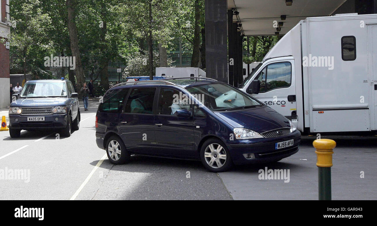 Police vehicles arrives at horseferry road magistrates court hi-res ...