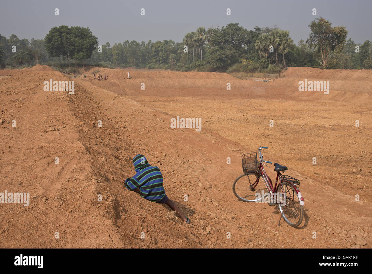 People building a reservoir in a water irrigation project in a rural ...