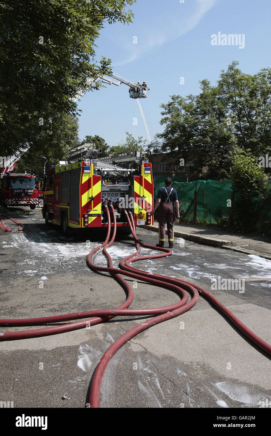 Firefighters tackle a fire at an an electricity sub station in Sydenham ...