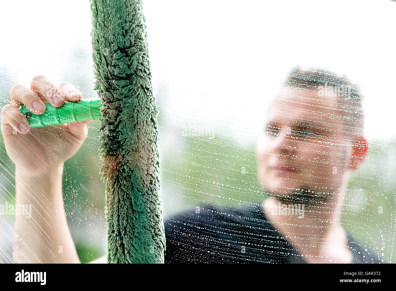 Male window cleaner outside (MR Stock Photo - Alamy