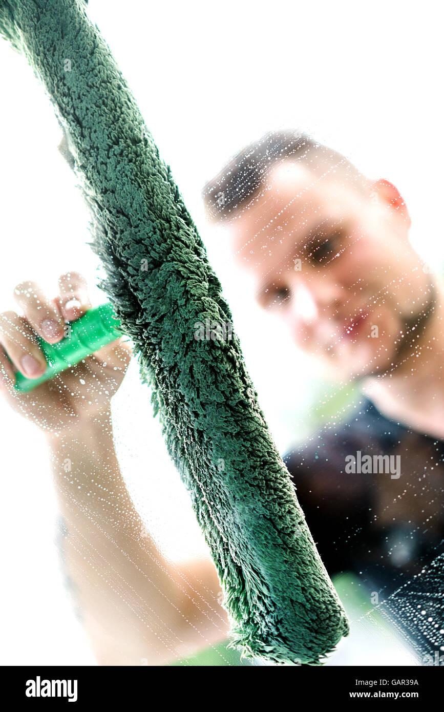 Male window cleaner outside (MR Stock Photo - Alamy