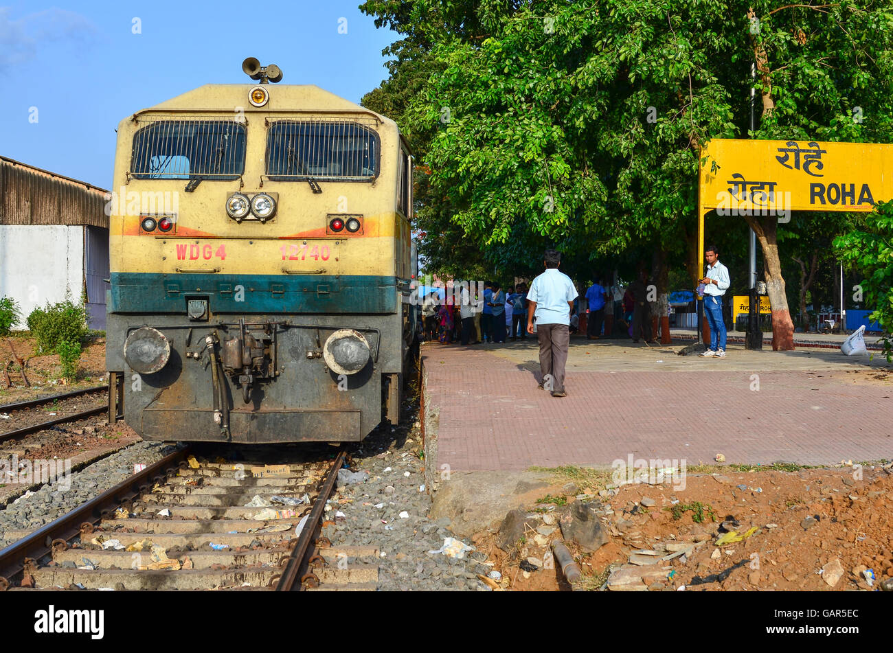 10104 Madgaon - Mumbai CST Mandovi Express waiting at the beautiful scenic Roha railway station ...