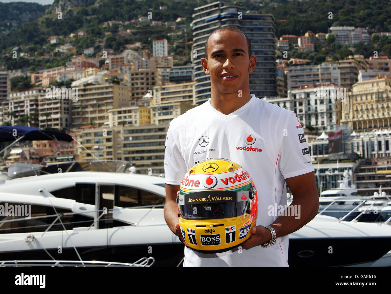 British Vodafone McLaren driver Lewis Hamilton poses at Monaco harbour ...