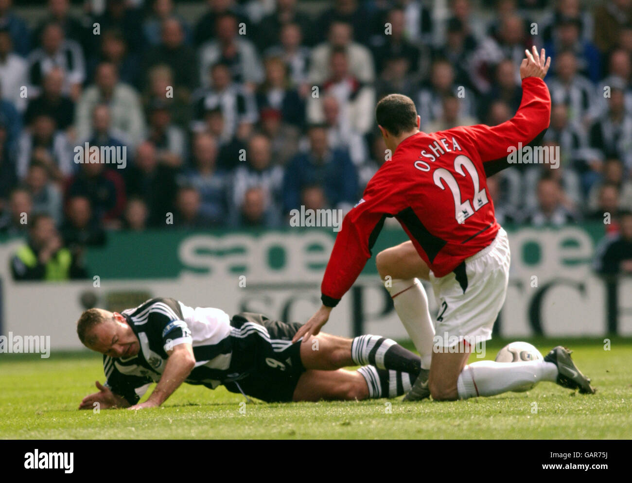 Newcastle United's Alan Shearer and Manchester United's John O'Shea ...
