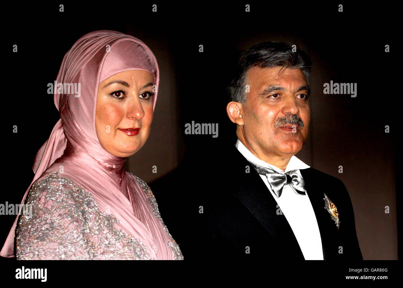 President Abdullah Gul (right) and wife Hayrunnisa Gul (left) wait to ...