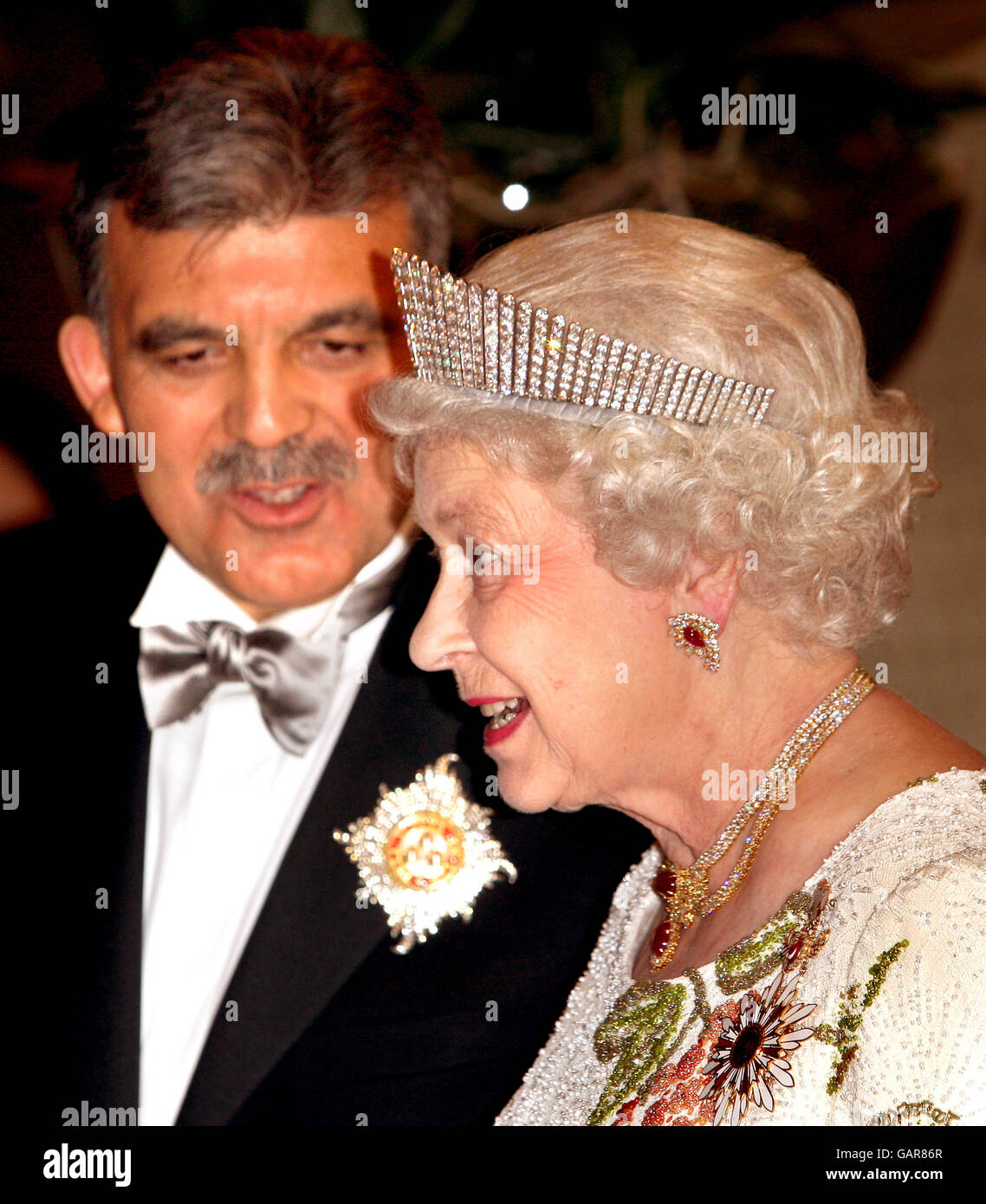Britain's Queen Elizabeth II speaks to President Abdullah Gul in the ...